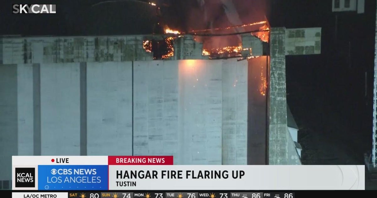 Hanger fire flare up in Tustin prompts school closures - CBS Los Angeles