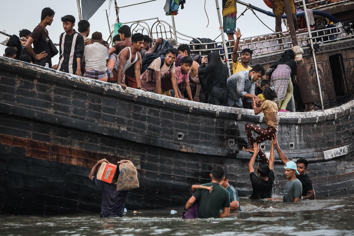 Boat crammed with Rohingya refugees, including women and children, sent ...