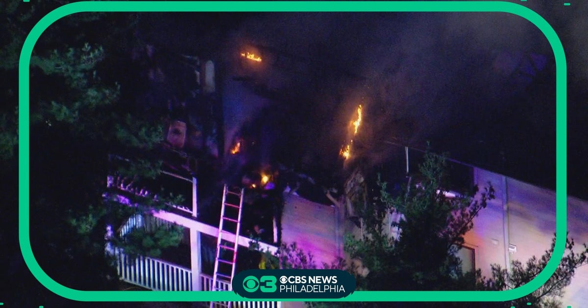 Fire burns through condo complex in Voorhees Township, New Jersey - CBS Philadelphia