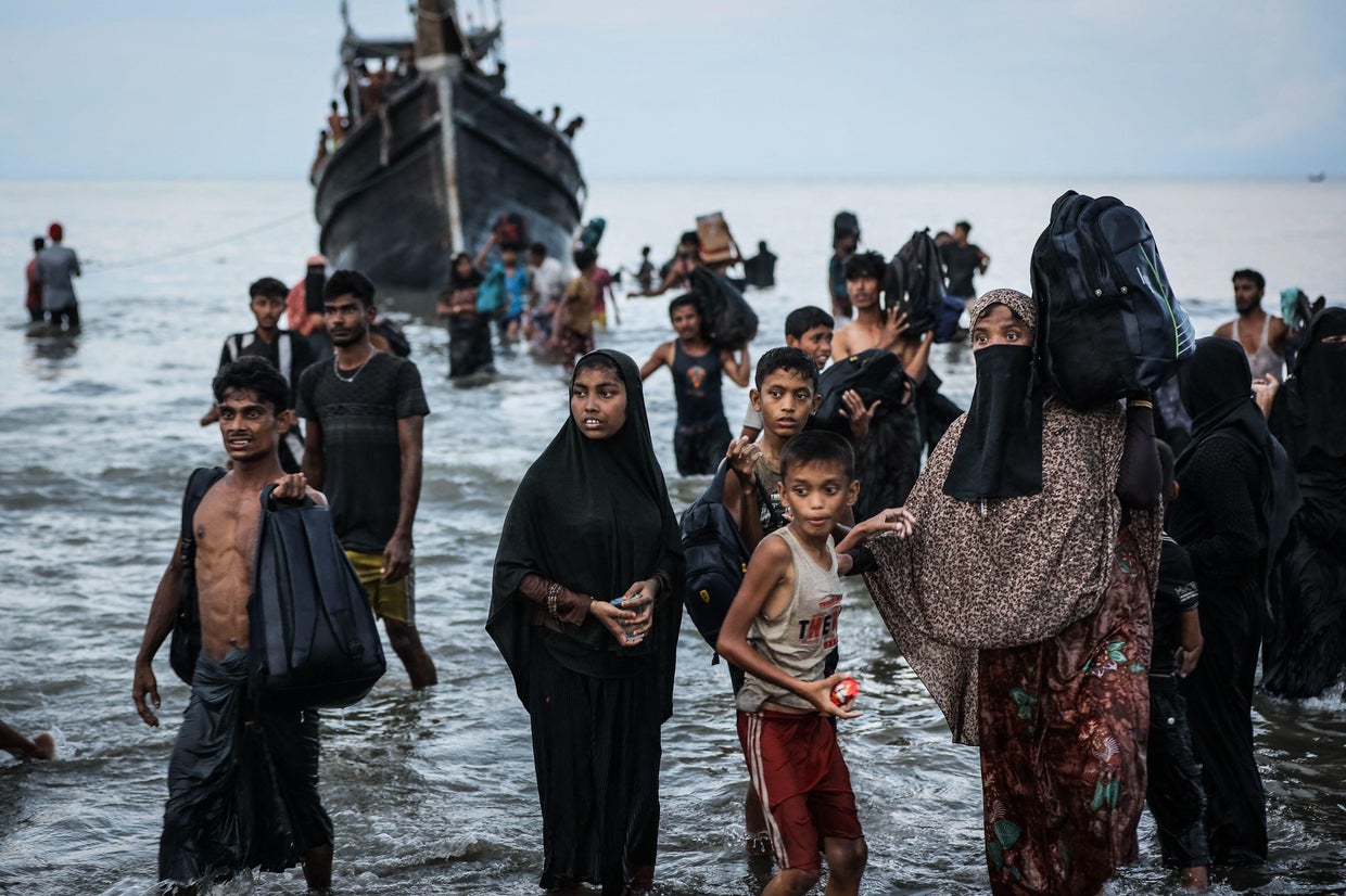 Boat crammed with Rohingya refugees, including women and children, sent ...