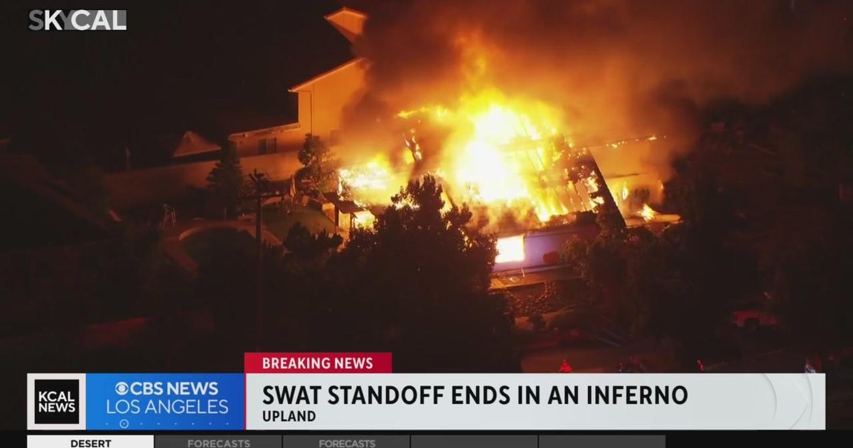 SWAT standoff ends in fiery inferno after suspect sets off explosives ...