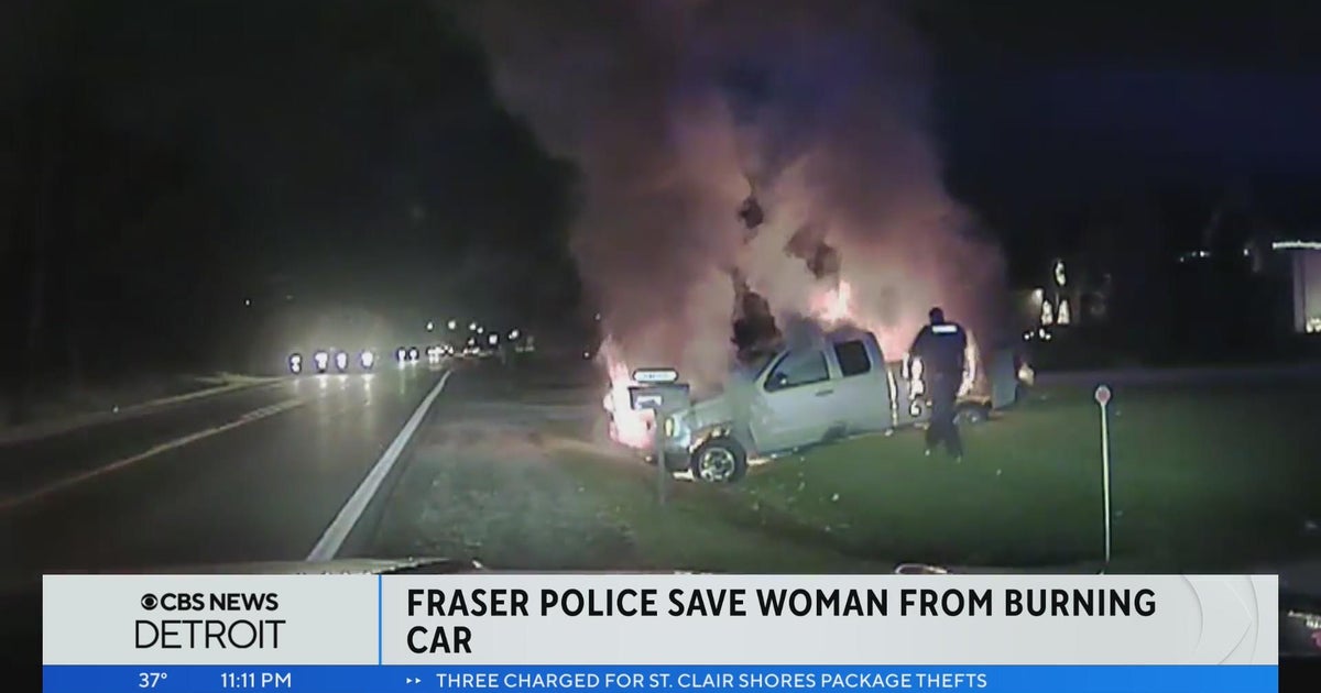 Fraser police officer saves woman from burning vehicle - CBS Detroit