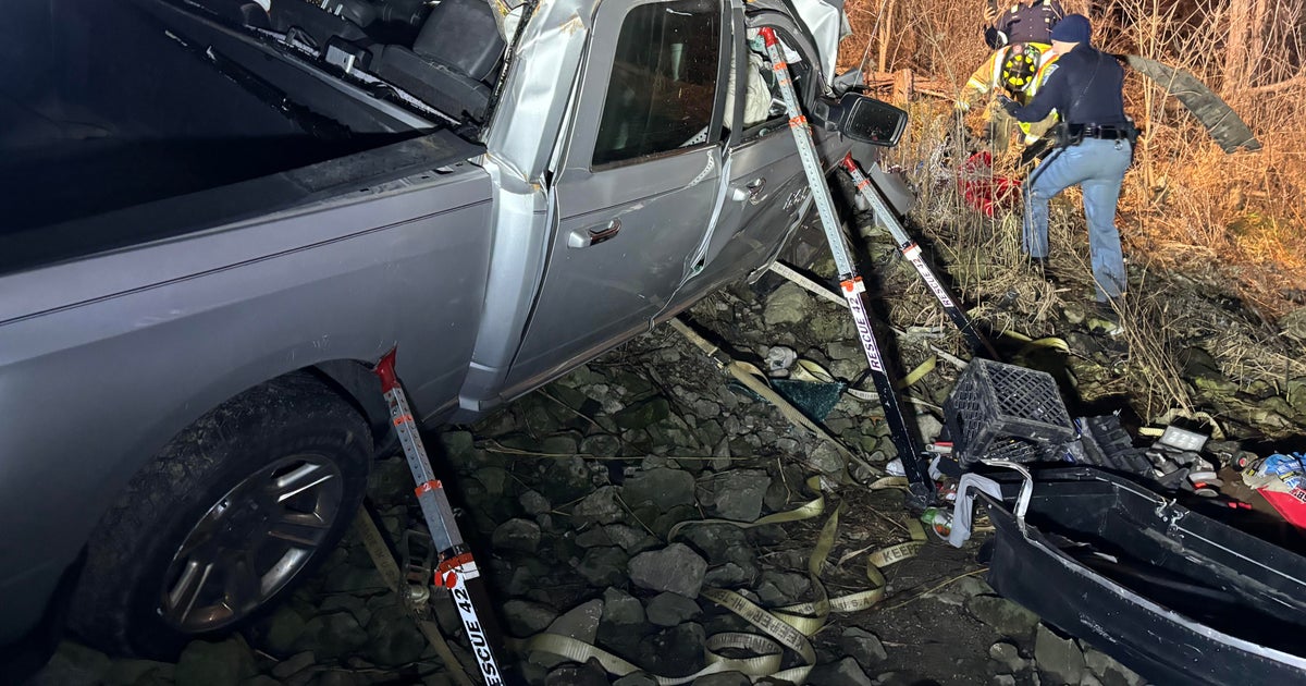 First responders braved dangerous terrain to rescue trapped driver - CBS Chicago