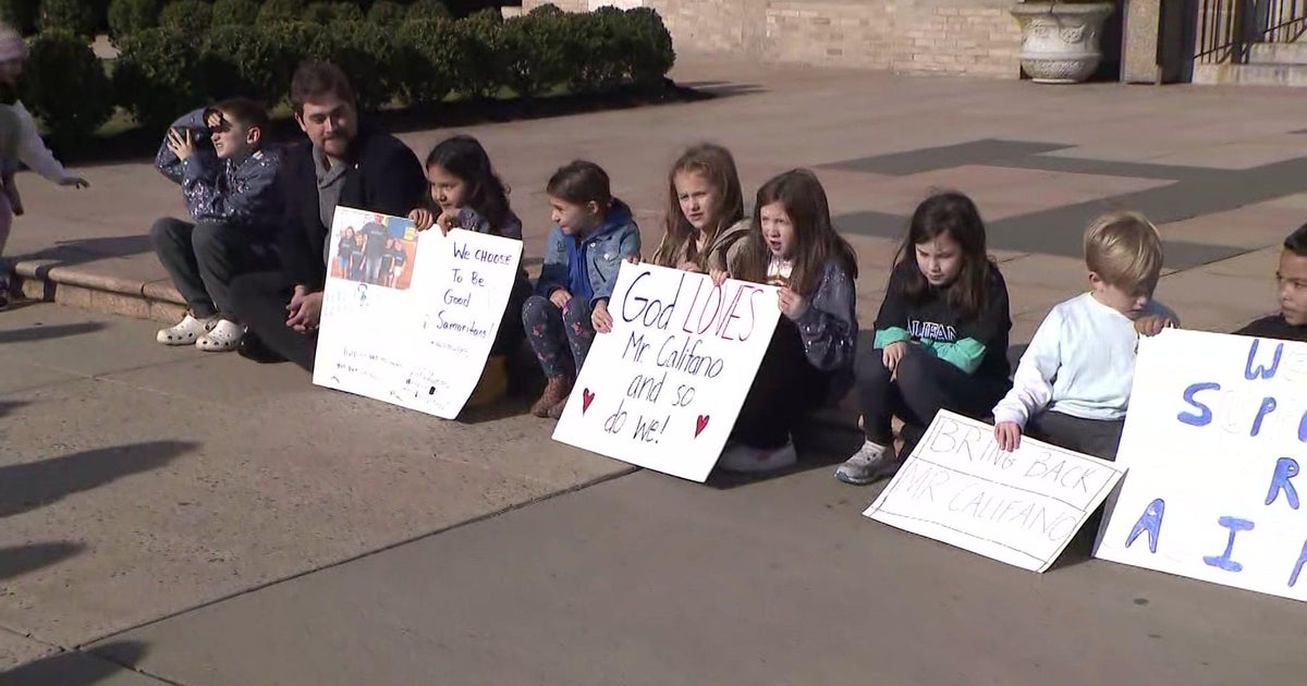 Long Island community gathers to support Catholic school teacher who ...