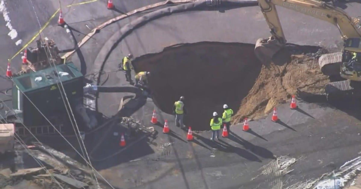 Road caves in after sewer line collapse in Delran Township, New Jersey ...