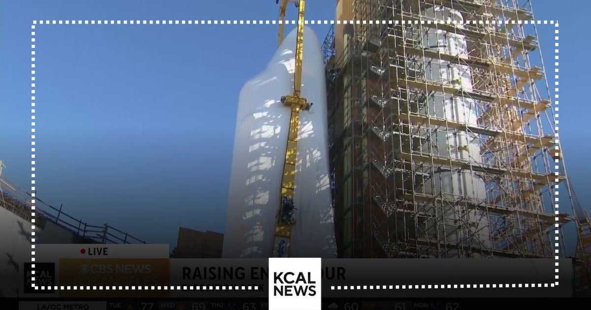 Endeavour shuttle lifted into final upright display - CBS Los Angeles