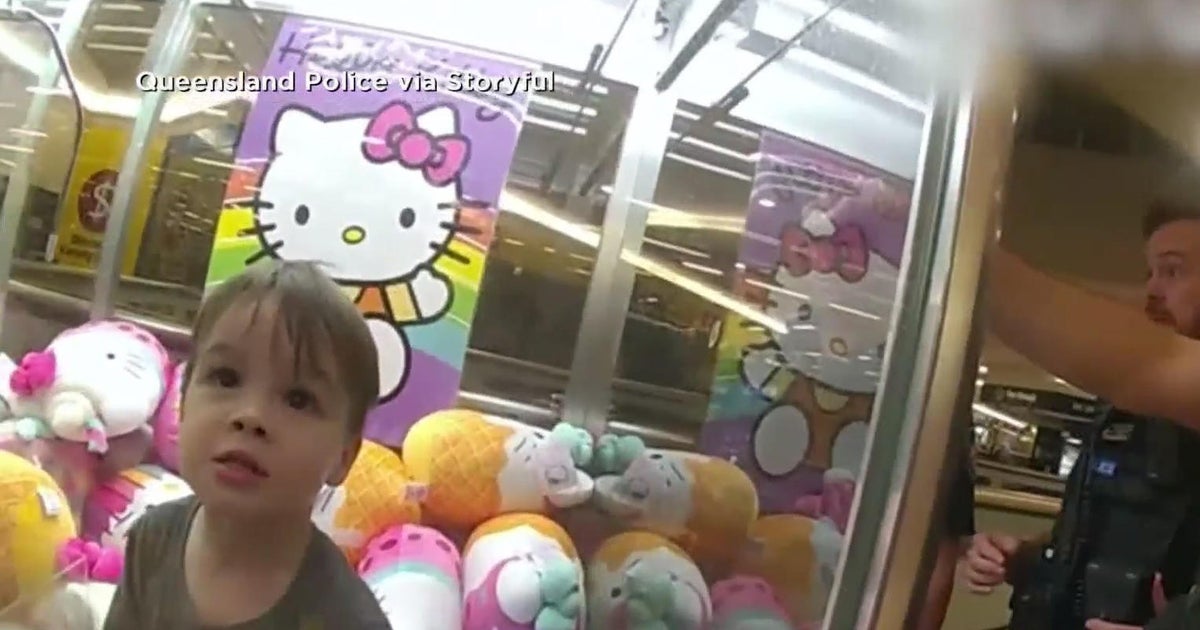 Child rescued from claw machine in Australia - CBS Chicago