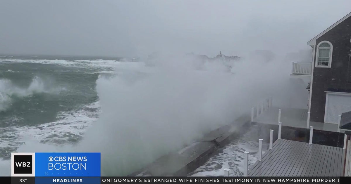 Water spills over Scituate seawall during winter storm - CBS Boston