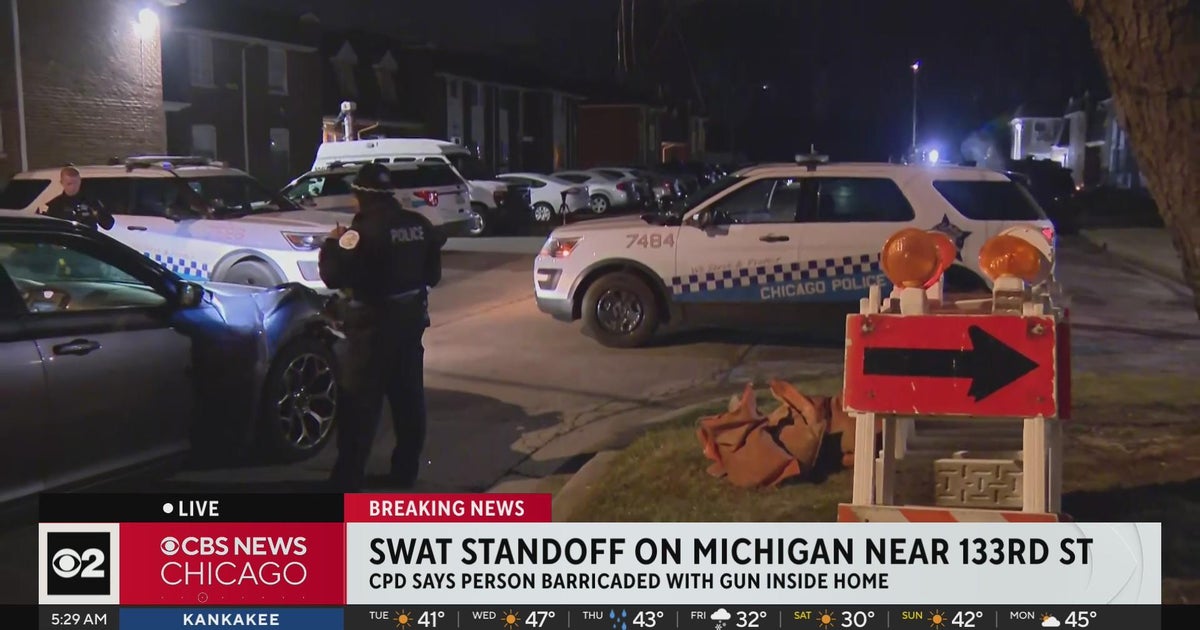 Person with gun barricaded inside home on Chicago's Far South Side ...