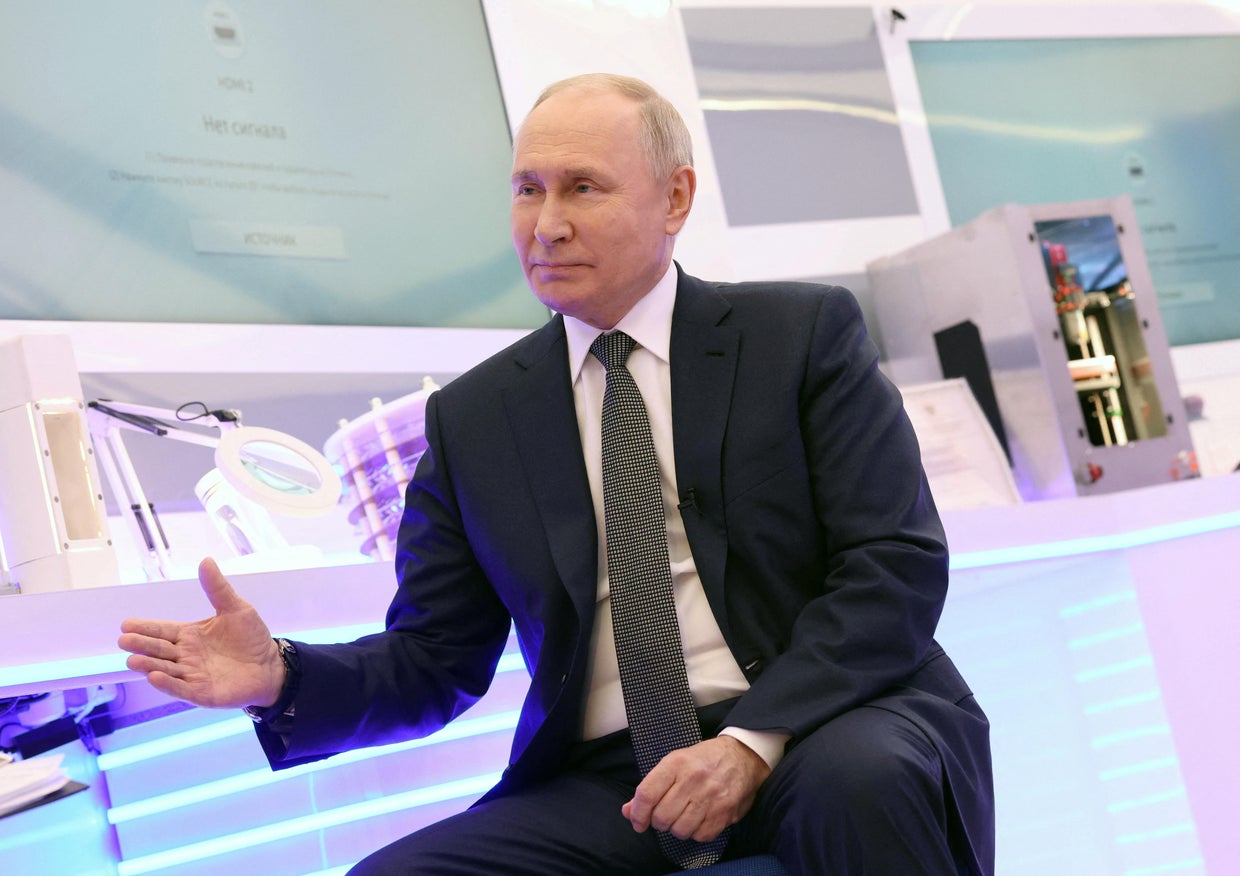 Putin claims he favors "more predictable" Biden over Trump - CBS News