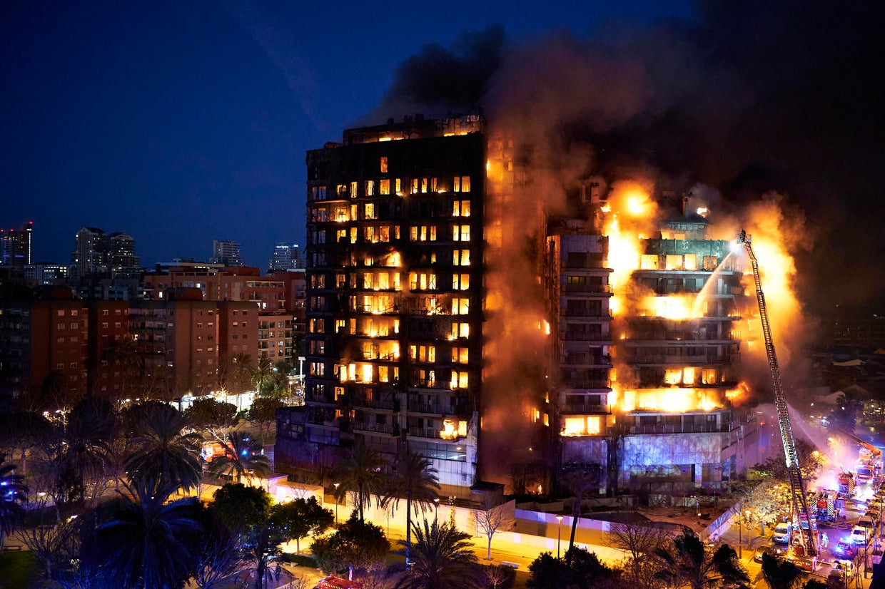 Fire traps residents in two high-rise buildings in Valencia, Spain ...