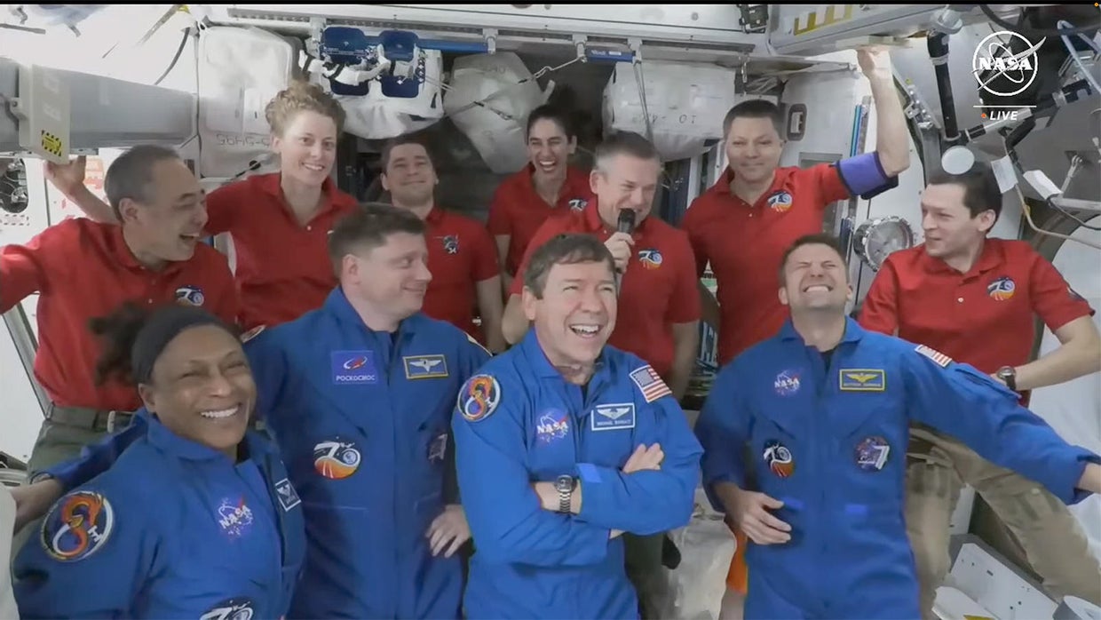 Crew Dragon docks with space station, bringing four fresh crew members ...