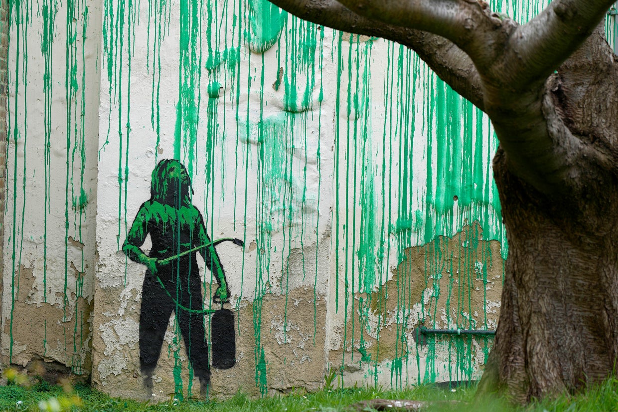 Banksy has unveiled a new mural that many view as a message that ...