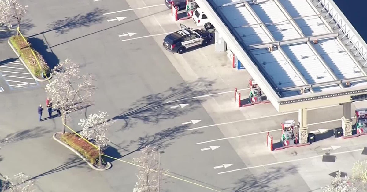 View above triple shooting scene outside Safeway supermarket in ...