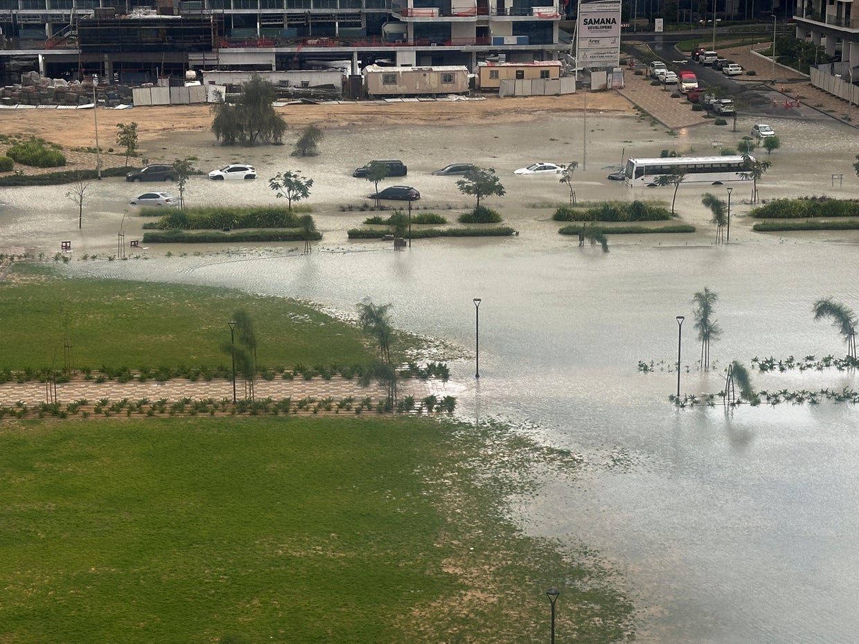 Dubai flooding hobbles major airport's operations as "historic weather ...