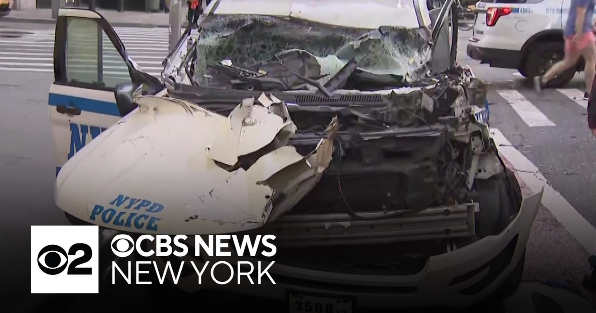 NYPD officers treated for minor injuries after colliding with tractor-trailer in Manhattan - CBS ...