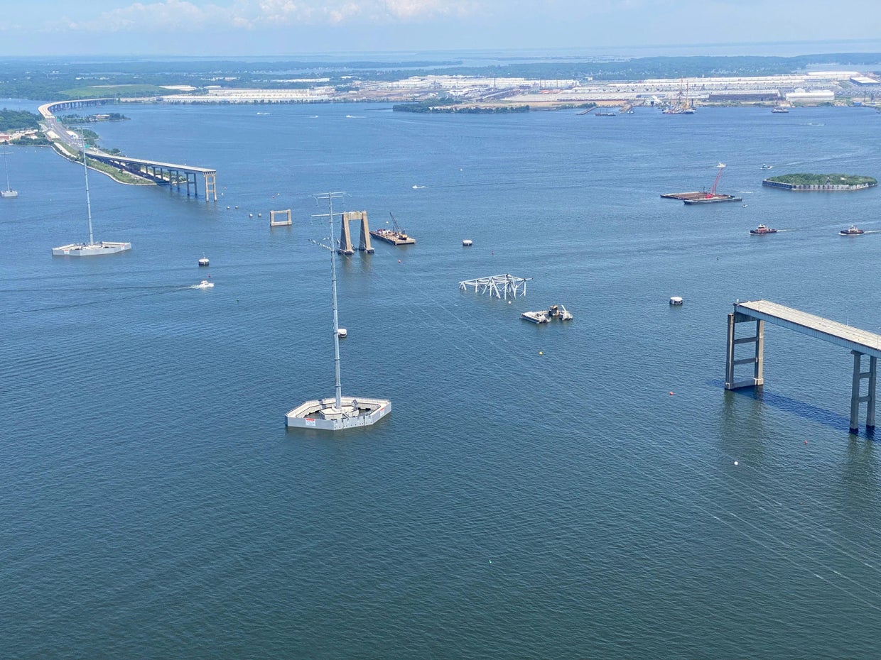 Photos: Aerial view of progress at the Key Bridge collapse site as ...