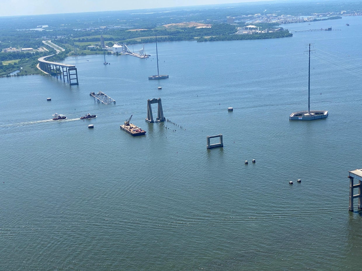 Photos: Aerial view of progress at the Key Bridge collapse site as ...