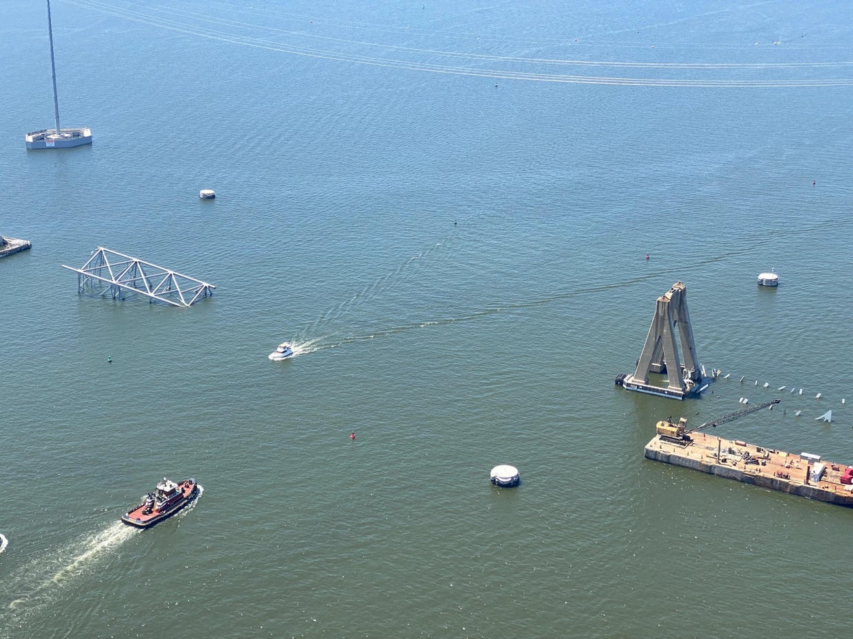 Photos: Aerial view of progress at the Key Bridge collapse site as ...