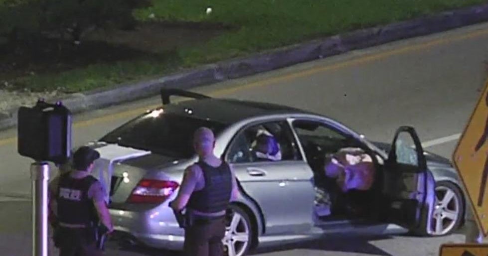 Two people were found dead in a bullet riddled car that crashed near ...