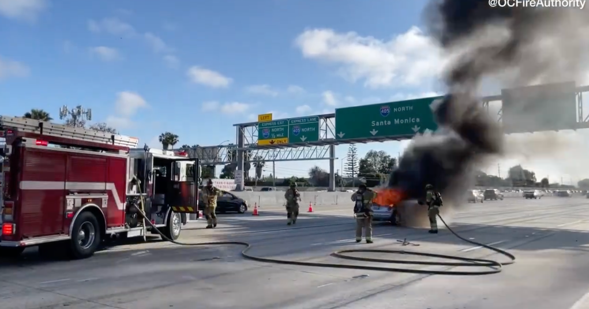 Burning car creates traffic snarl on 405 Freeway in Orange County - CBS ...