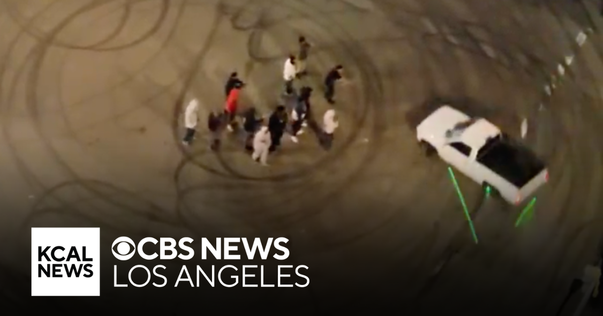 Wild video shows street takeover on the streets of Downtown LA - CBS ...
