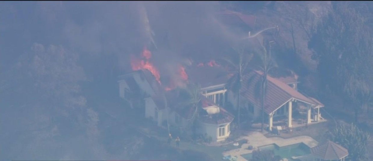 Homes destroyed, evacuation orders issued as pair of large fires rage ...