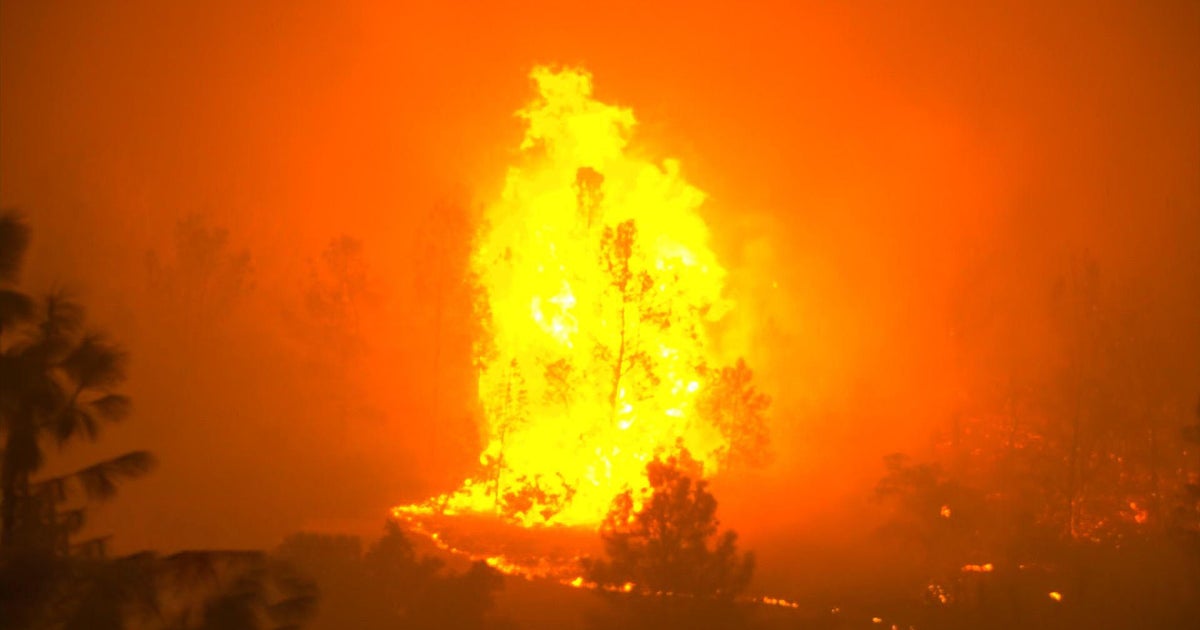 Dozens of massive wildfires rage across western U.S. - CBS News