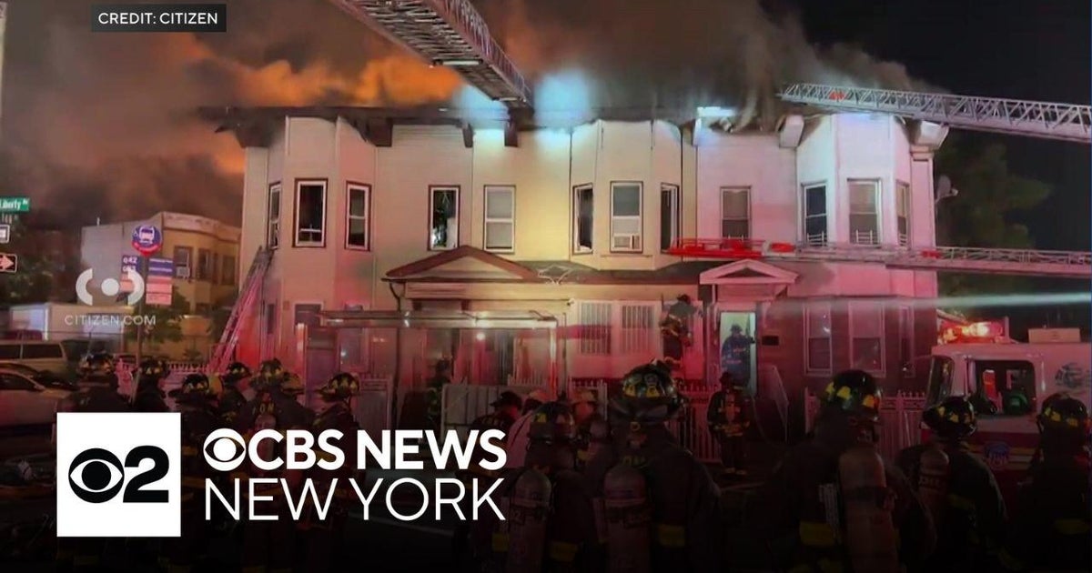 Man jumps out window to escape Queens house fire - CBS New York