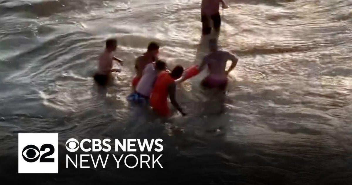 Man saved after by lifeguards after swimming hours in Queens - CBS New York