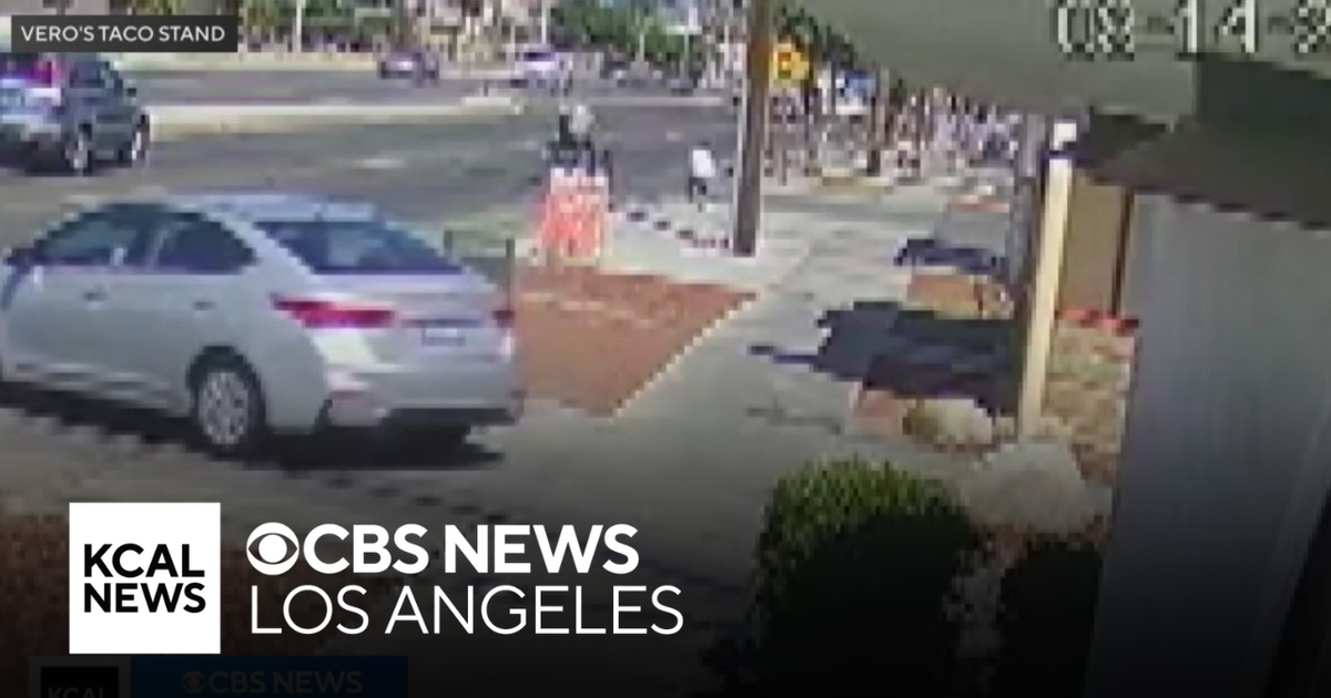 Surveillance camera captures moments shots ring out during argument in ...