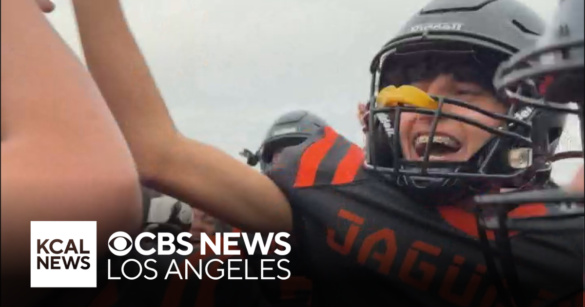 Del Sol High School football team celebrates its first home win - CBS ...