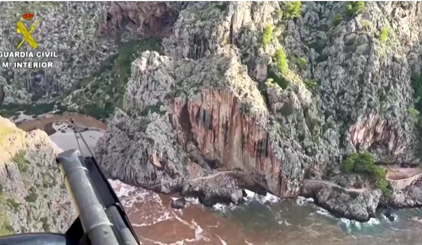 British woman found dead, man missing after flash flood hits Spanish island of Mallorca - CBS News