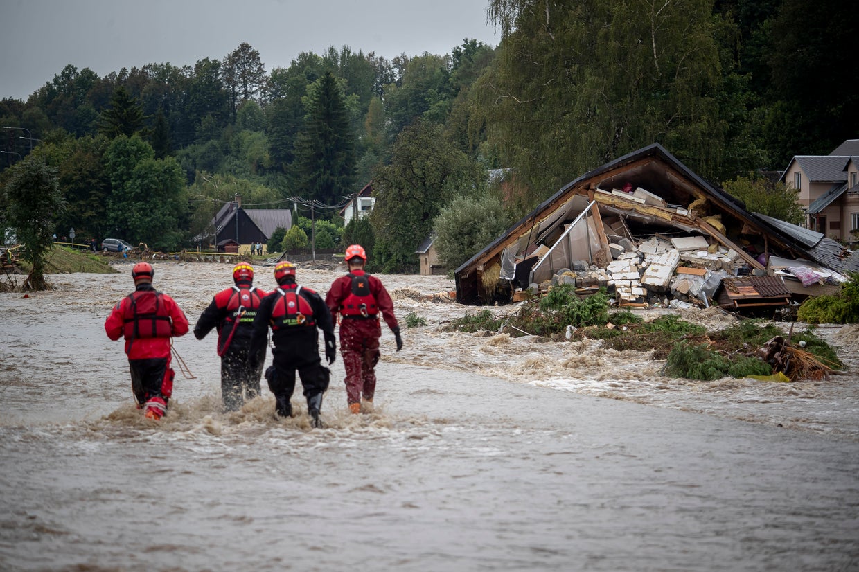 At least 14 dead as torrential rain unleashes flooding across Central ...