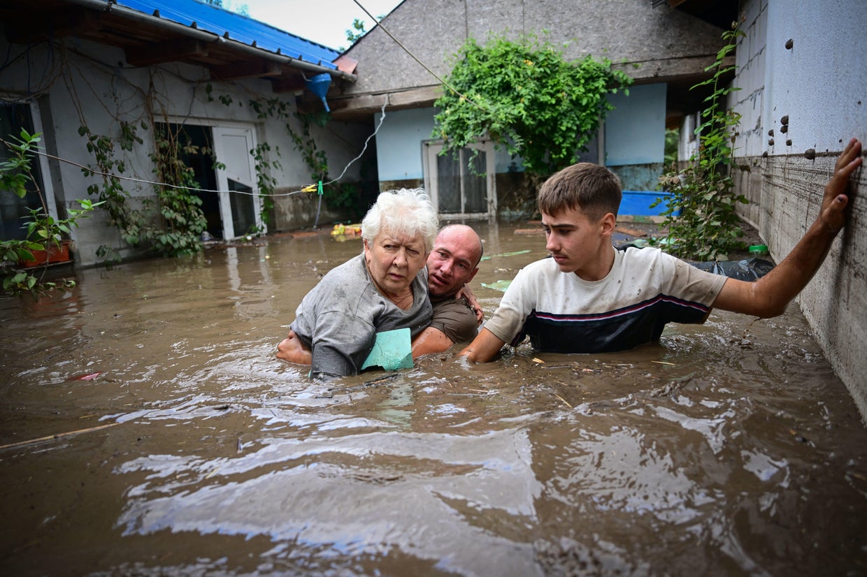 At least 14 dead as torrential rain unleashes flooding across Central ...