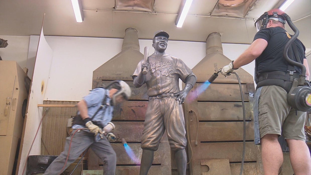 Northern Colorado artists help replace vandalized Jackie Robinson statue in Kansas - CBS Colorado