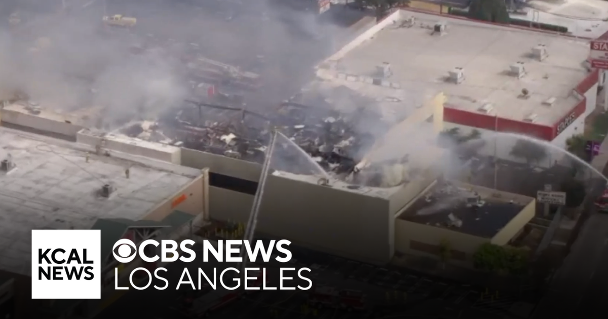 Hours-long firefight continues with "stubborn" fire at vacant building near West LA - CBS Los ...