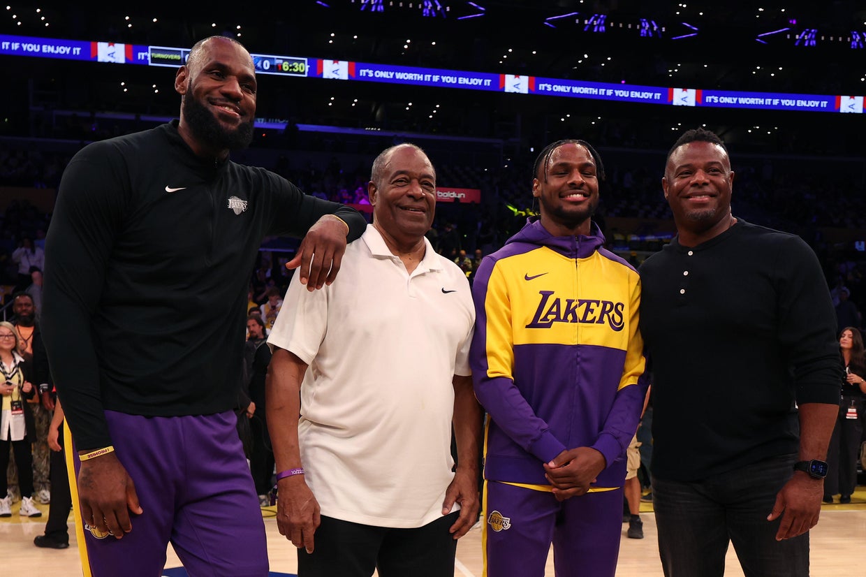 LeBron and Bronny James make history as the NBA's first father-son duo to play together - CBS ...