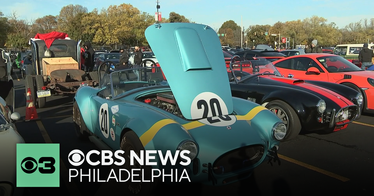 Luxury and classic car enthusiasts fill up their rides to drive out ...