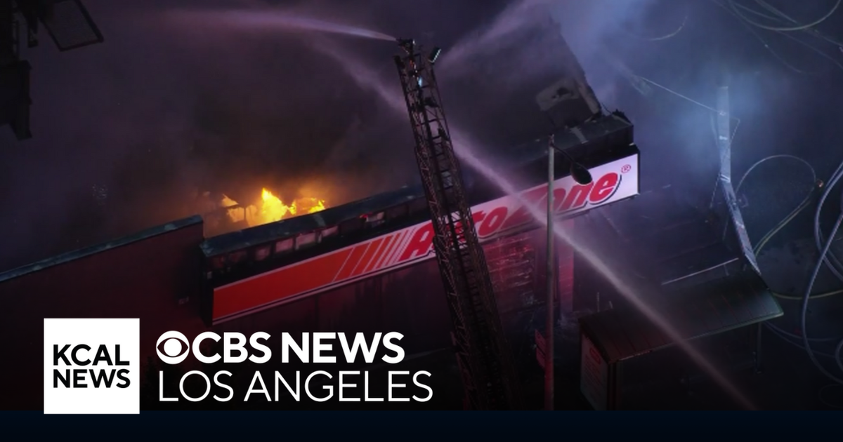 Firefighters battle massive blaze at AutoZone in Hollywood - CBS Los ...