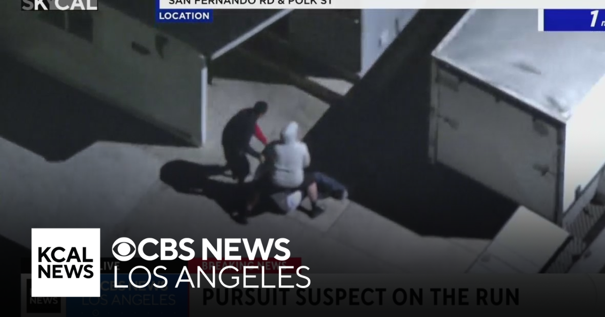 Foot pursuit ends when homeowners tackle suspect and hold him until ...