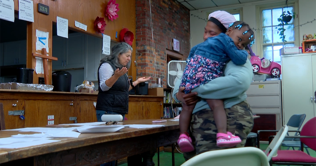 New to the U.S.: How migrants are building new lives in America - CBS News