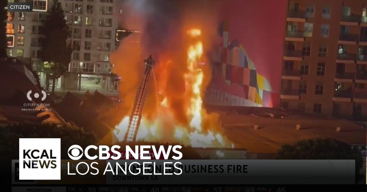 Fire crews work to put out DTLA two-story building blaze - CBS Los Angeles