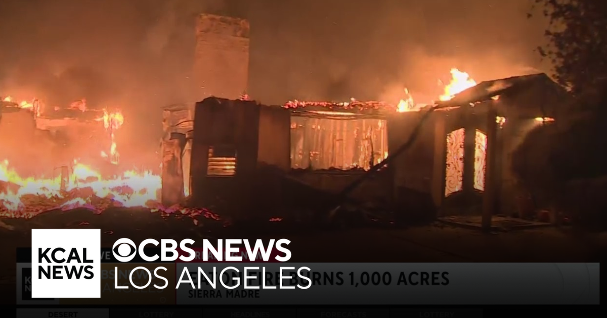 Homes burn as Eaton Fire continues to burn east into Sierra Madre - CBS ...