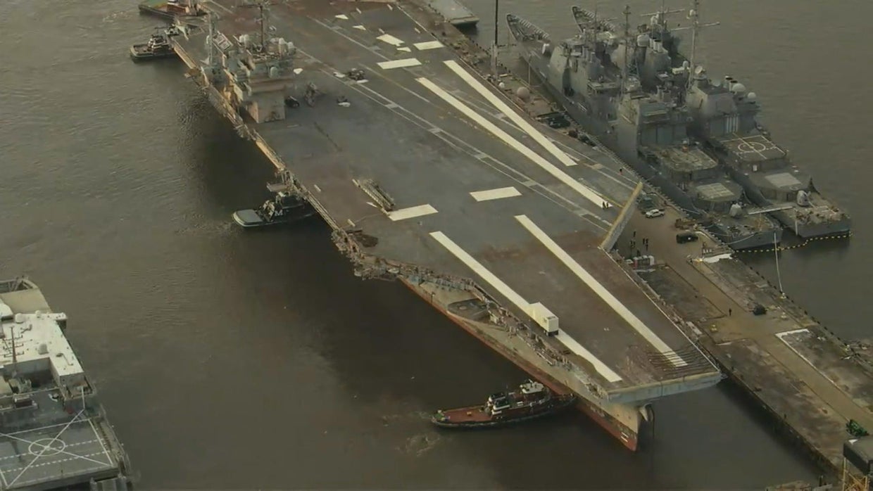 USS John F. Kennedy leaving Philadelphia's Navy Yard to be dismantled ...