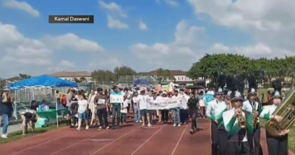 Felix Varela Senior High students and parents take part in "Walk for ...