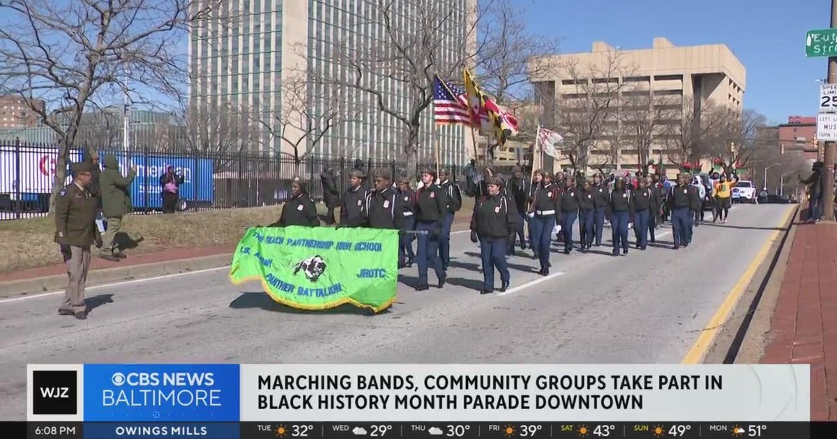 Marching bands, community groups walk in Baltimore parade - CBS Baltimore