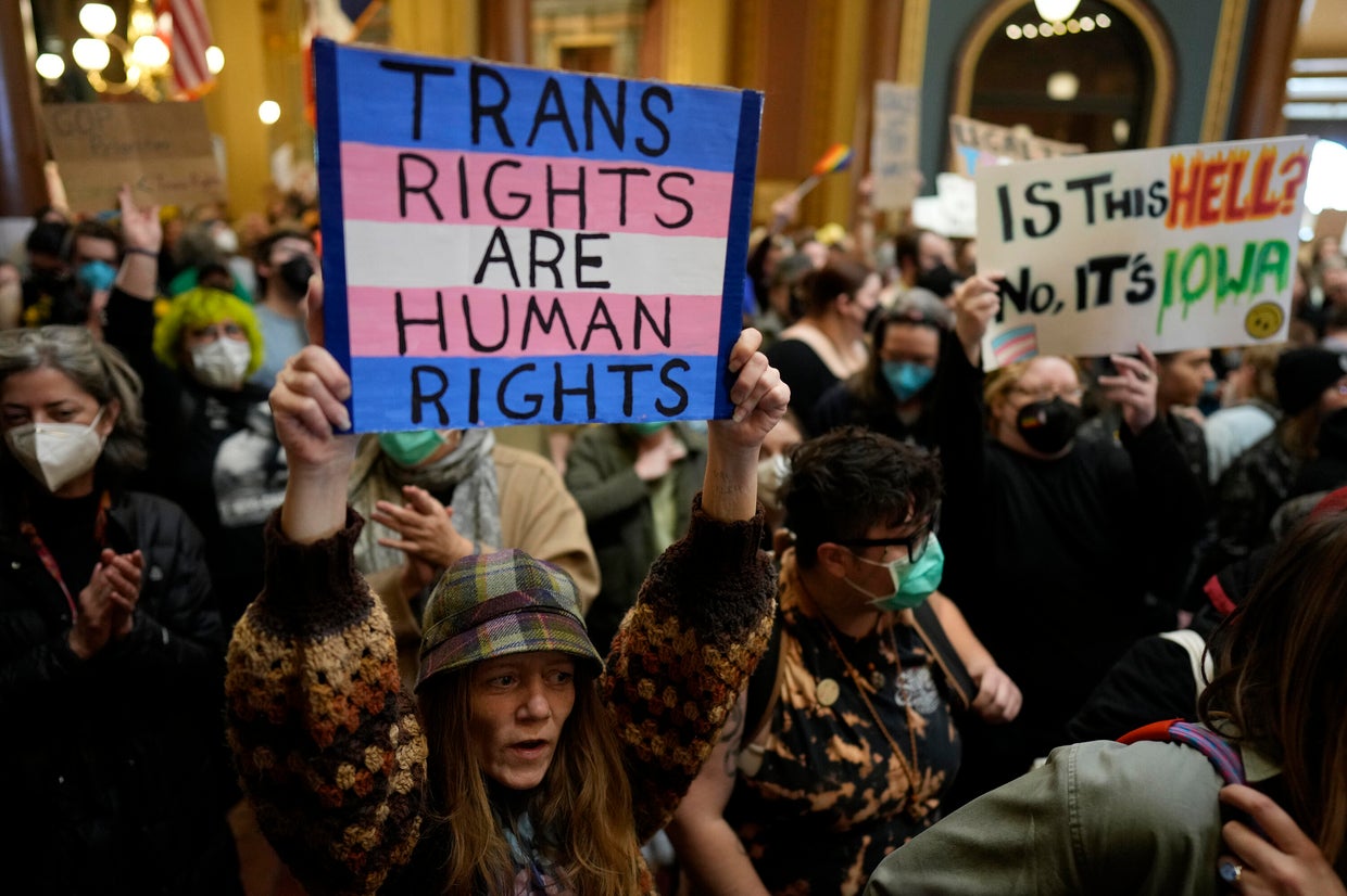 Iowa governor signs bill ending transgender rights protections despite ...
