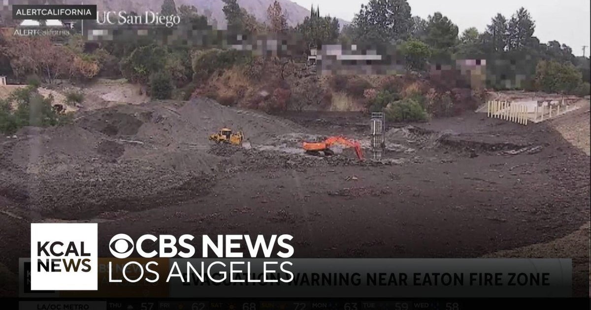 Neighborhoods near the Eaton Fire remain under evacuation warnings ...