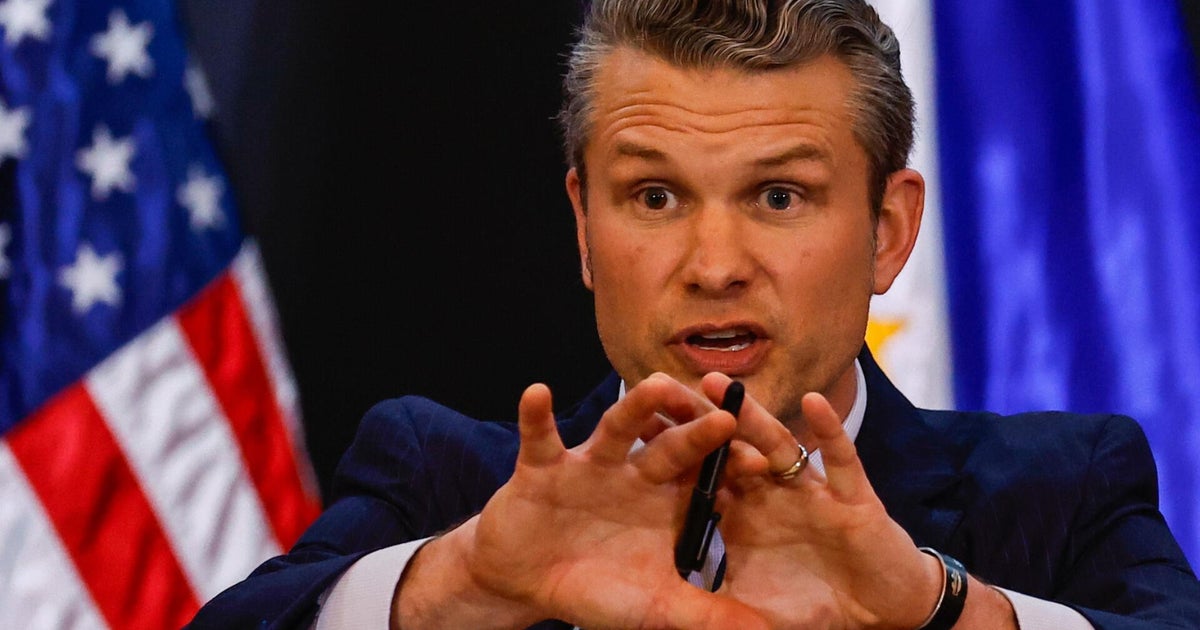 Signal texts controversy chases Hegseth after overseas trip - CBS News